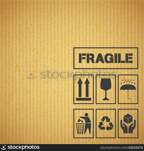 Package handling labels on cardboard. This side up, fragile, handle ...